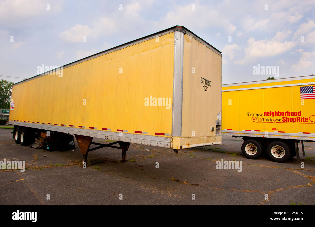 Yellow trailers at a depot Stock Photo - Alamy