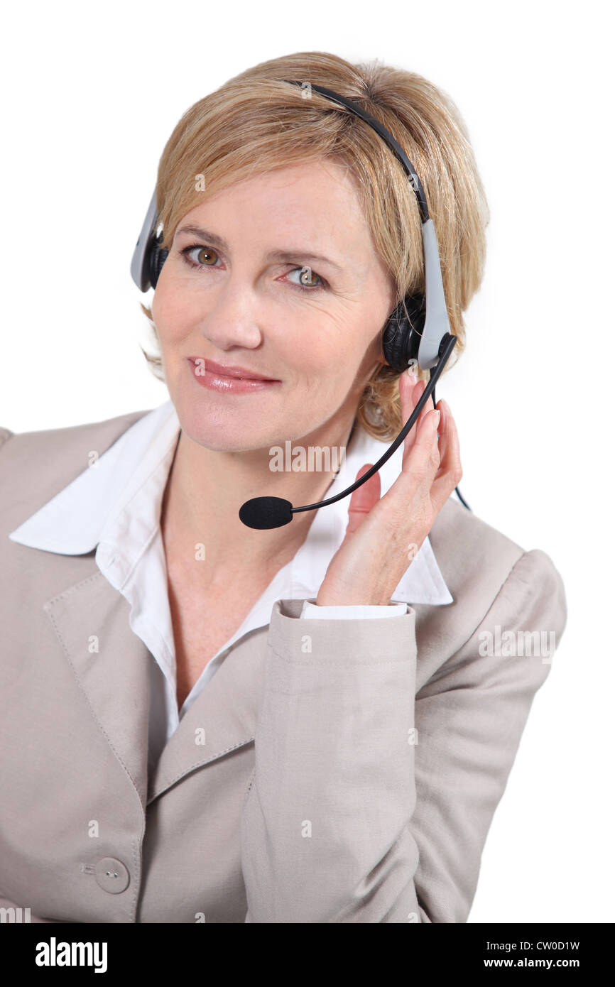 Secretary wearing a headset Stock Photo - Alamy