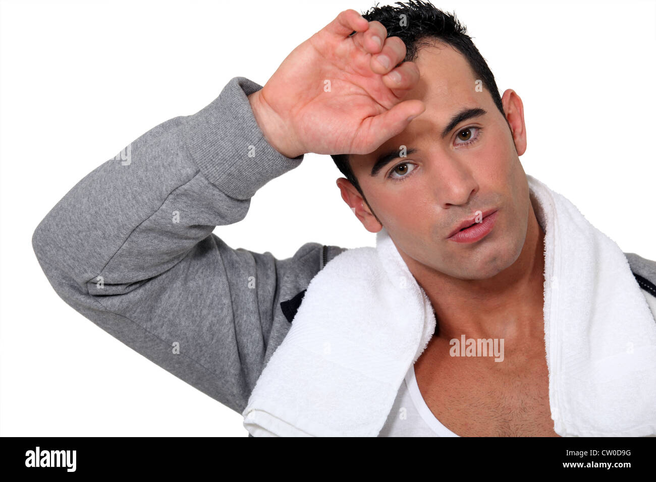 Man wiping sweat from forehead hi-res stock photography and images - Alamy