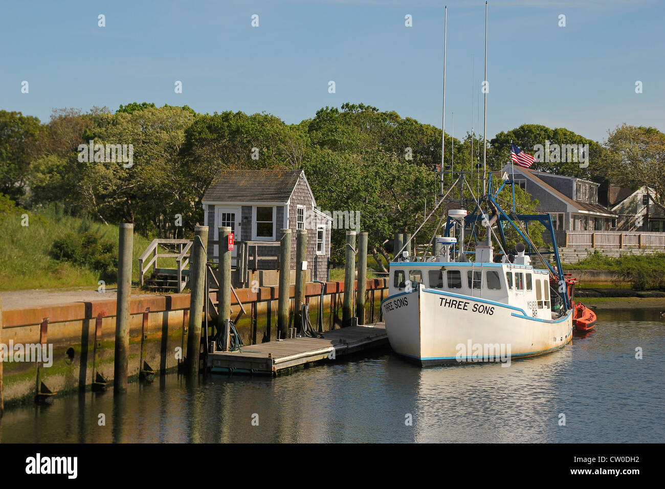 A fishing boat docked in Saquatucket Harbor, Harwich Port, Cape Cod ...