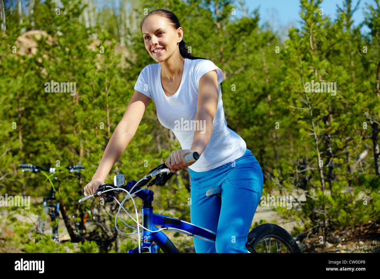 Pretty young woman bicycle hi-res stock photography and images - Alamy
