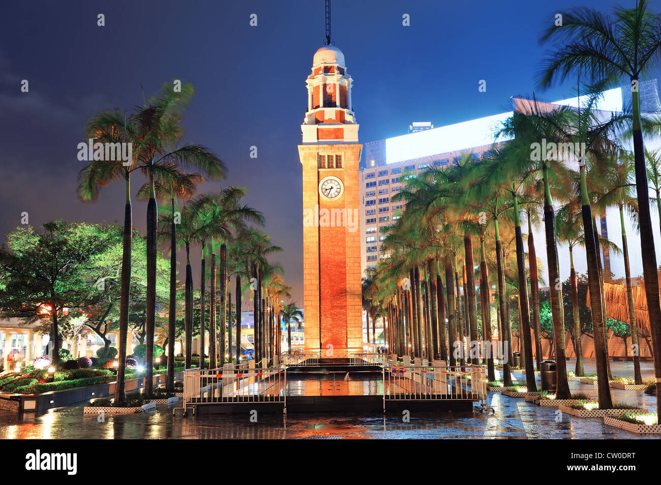 Clock tower in Hong Kong at night Stock Photo - Alamy