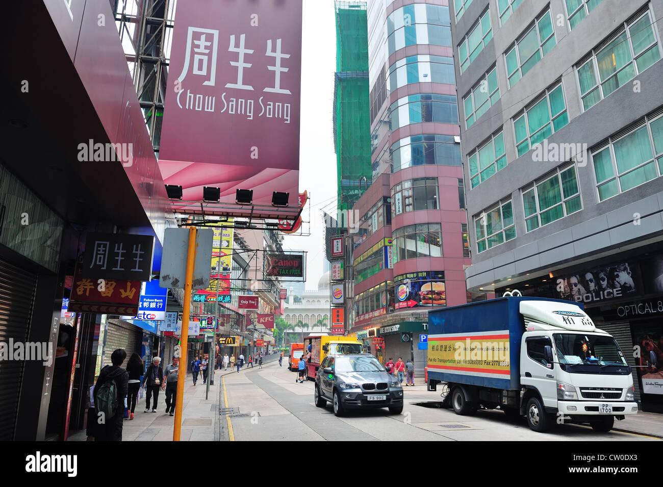 Street view with traffic and shops Stock Photo - Alamy