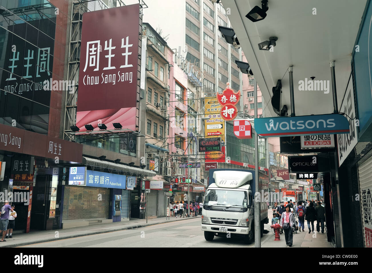 Street view with traffic and shops Stock Photo - Alamy