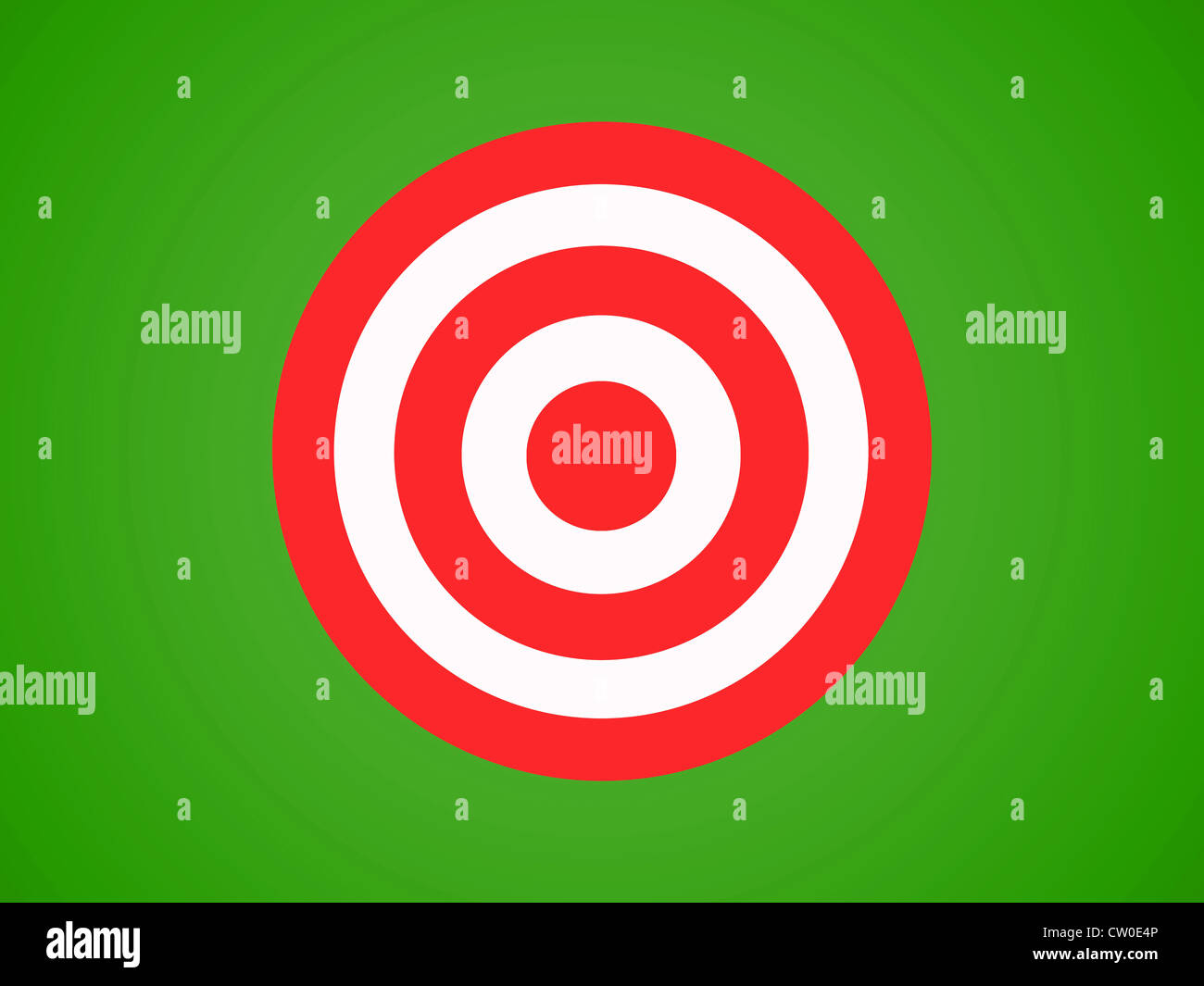 A target isolated against a green background Stock Photo - Alamy