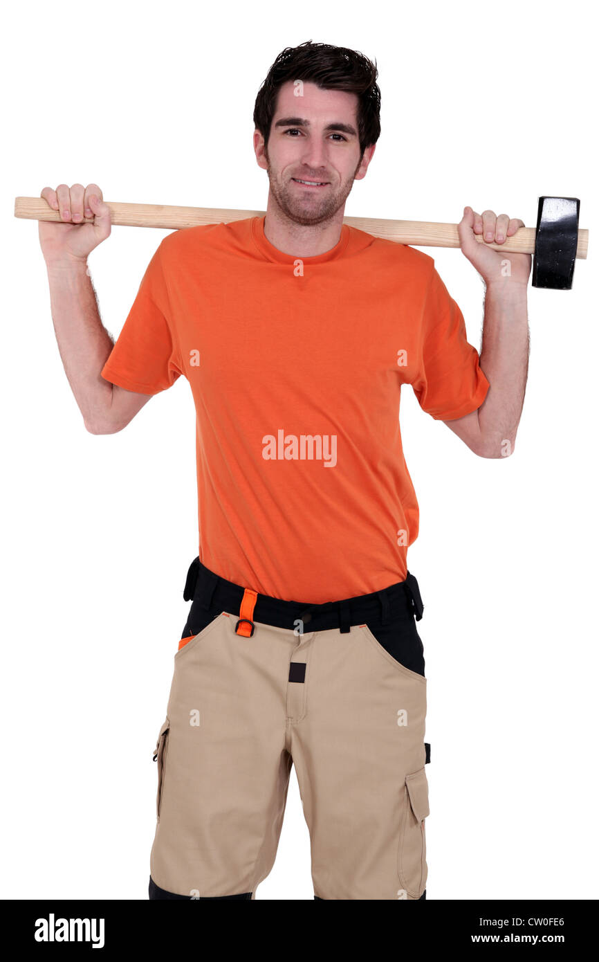 craftsman holding a hammer Stock Photo - Alamy