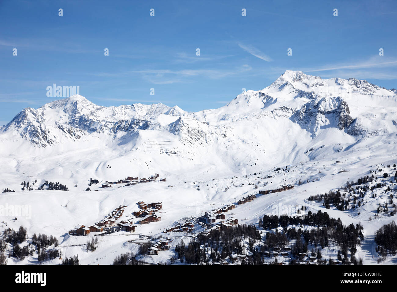Trees and ski slopes on snowy mountains Stock Photo - Alamy
