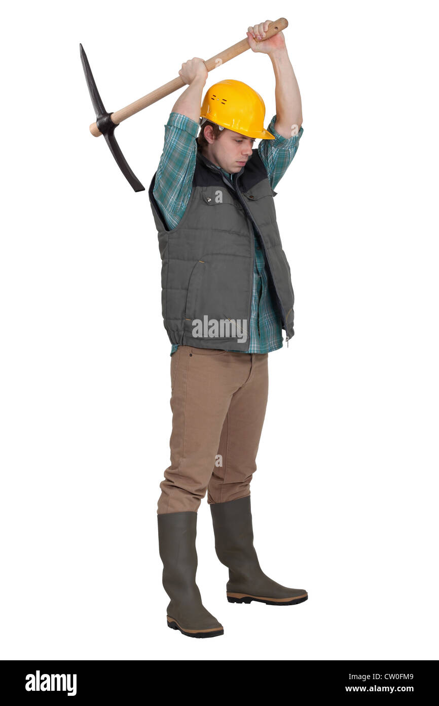 Man using pickaxe hi-res stock photography and images - Alamy