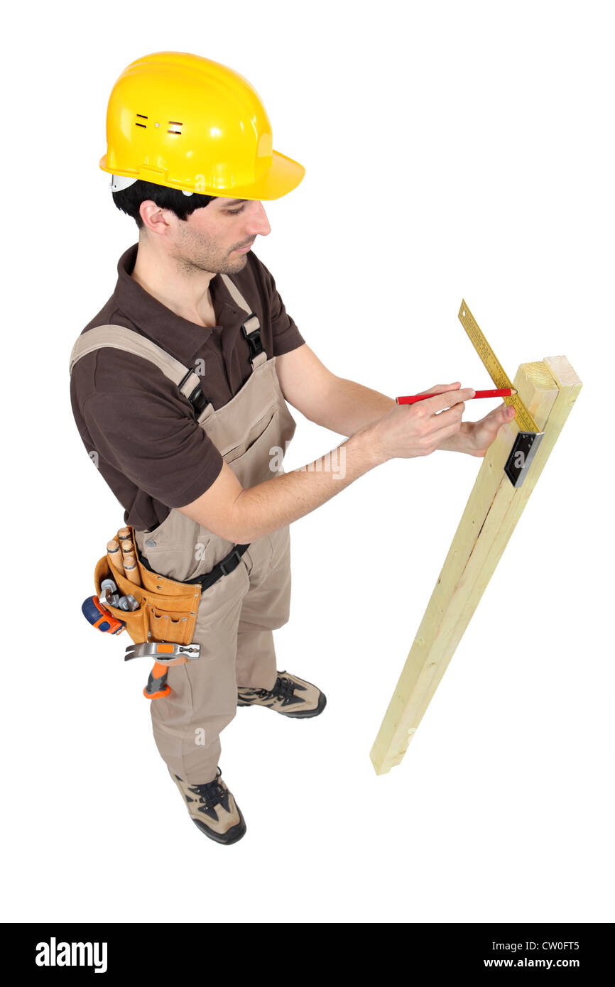 Carpenter using a angle iron Stock Photo - Alamy