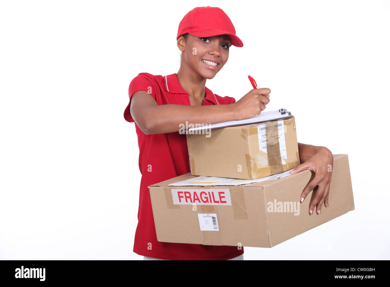 Woman making a delivery Stock Photo - Alamy