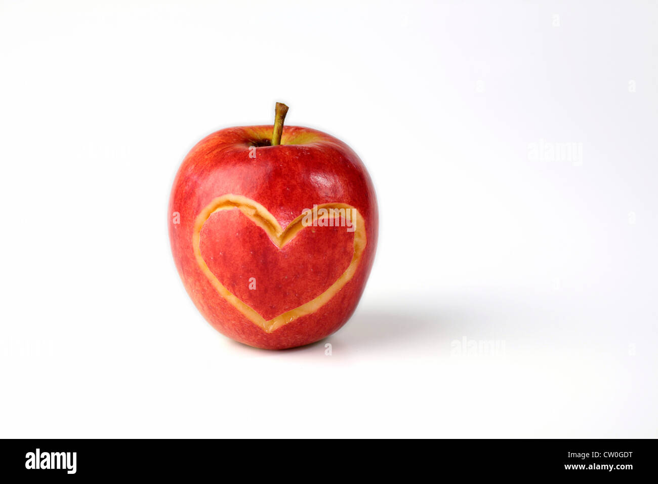 Apple heart isolated on a white background Stock Photo - Alamy
