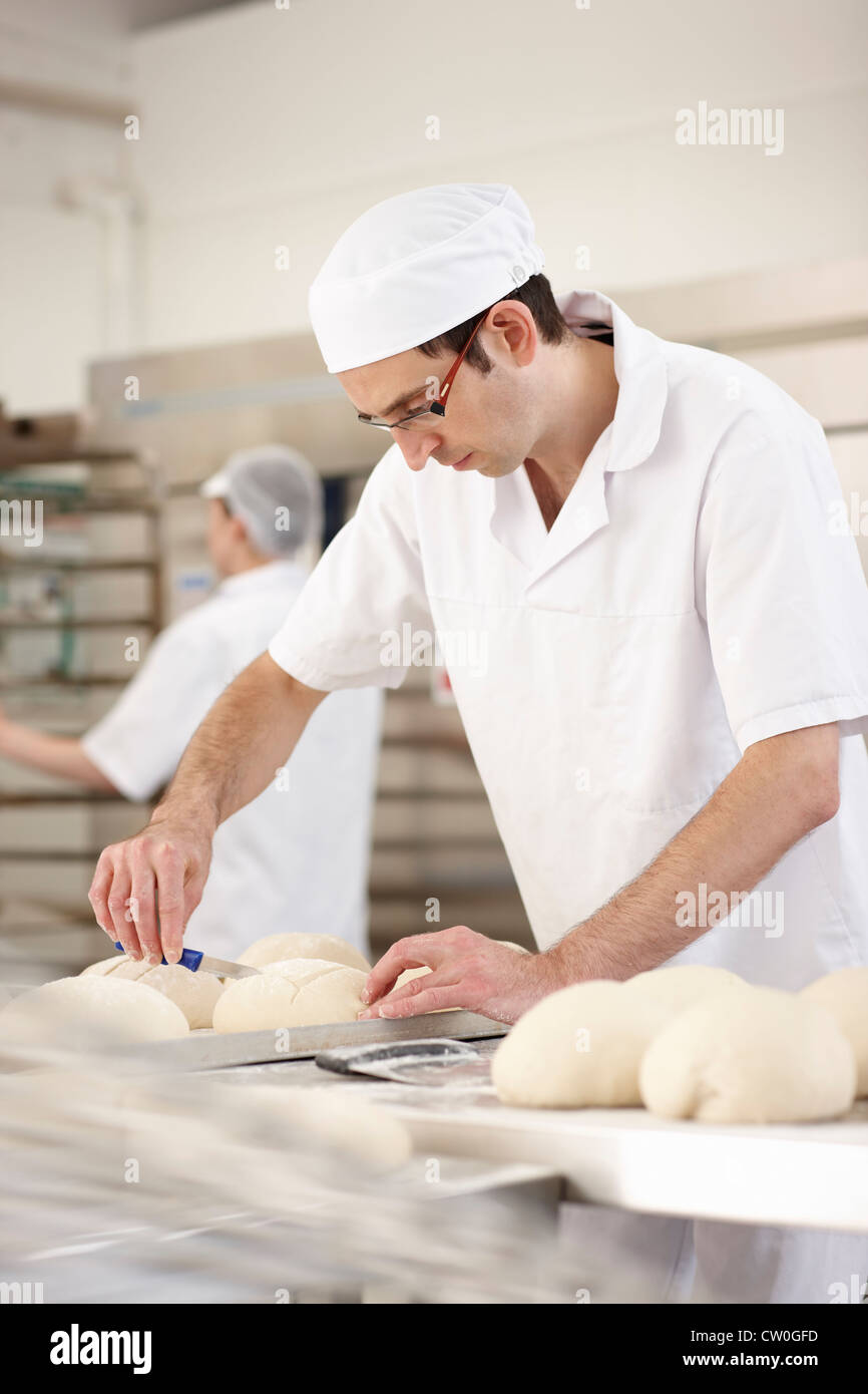 Man molding bread hi-res stock photography and images - Alamy