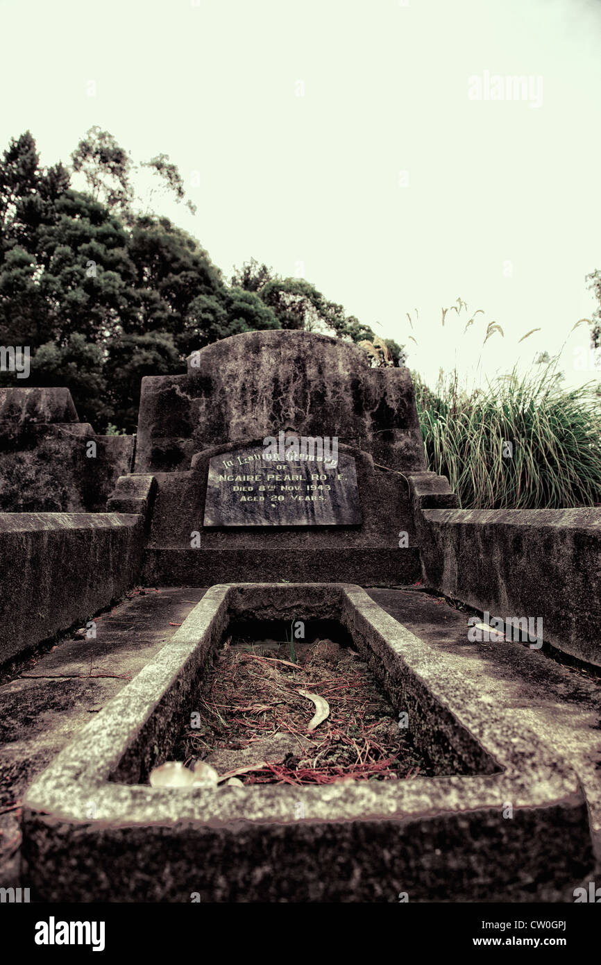 Neglected grave in a cemetery Stock Photo - Alamy