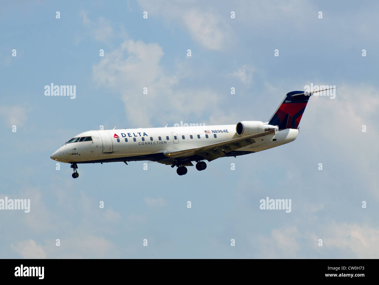 Airplane on a landing path Stock Photo - Alamy