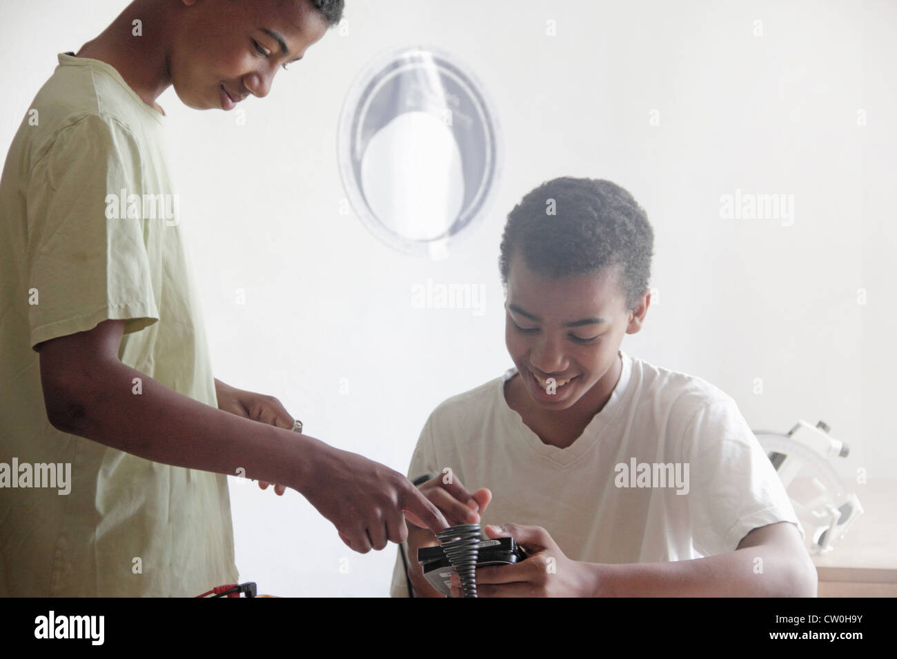 Students working in science lab Stock Photo - Alamy