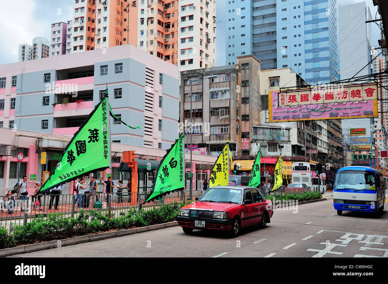 Street view with traffic and shops Stock Photo - Alamy