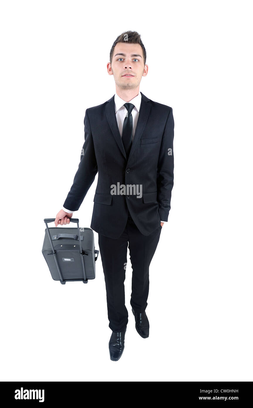 Isolated young business man with luggage Stock Photo - Alamy