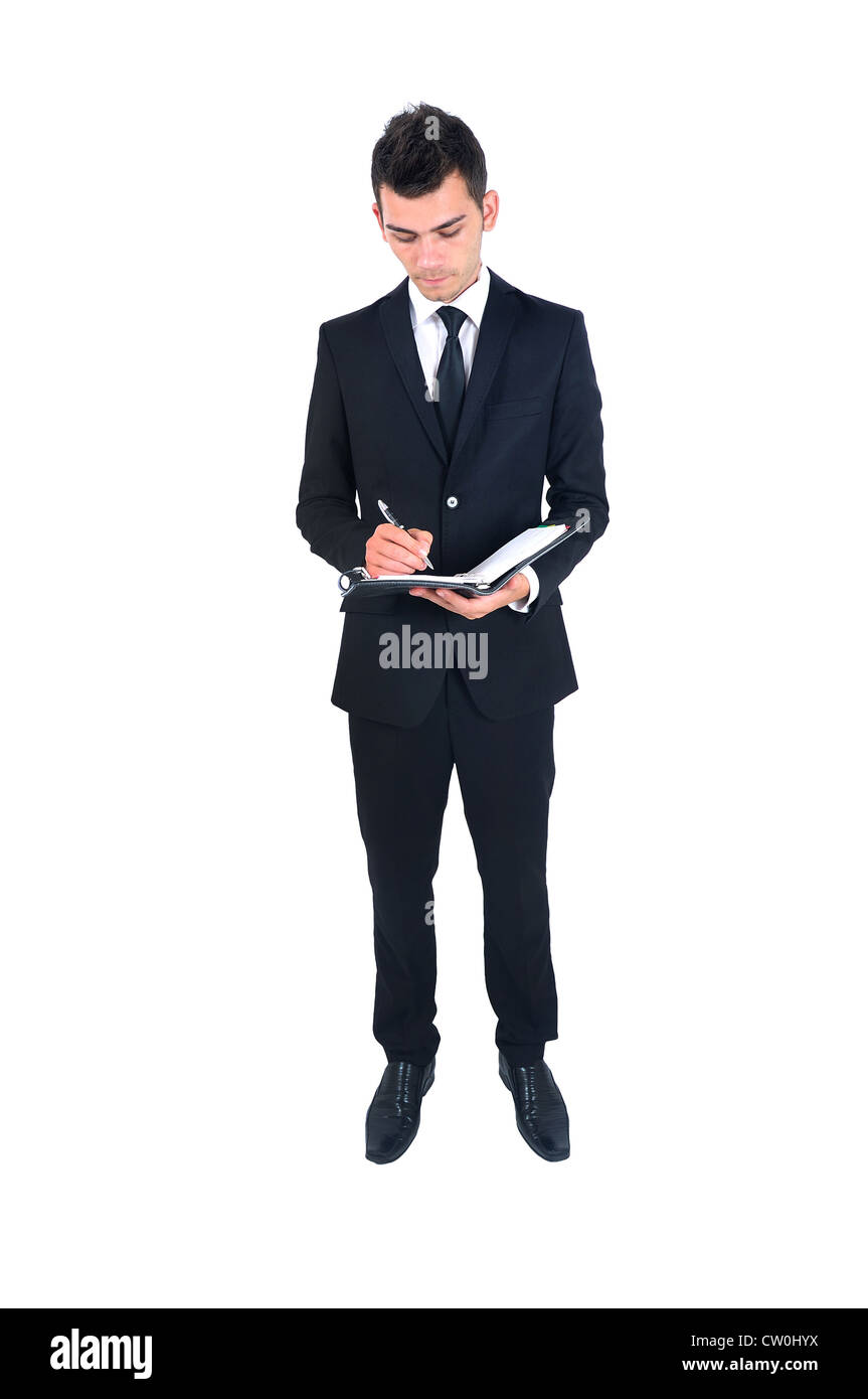 Isolated young business man with notebook Stock Photo - Alamy