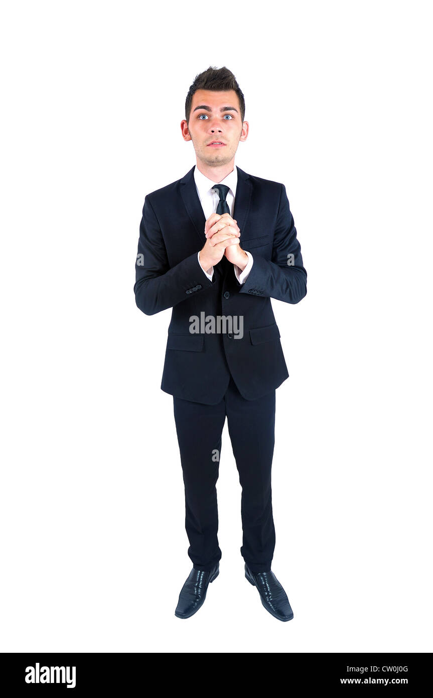 Isolated young business man praying Stock Photo - Alamy