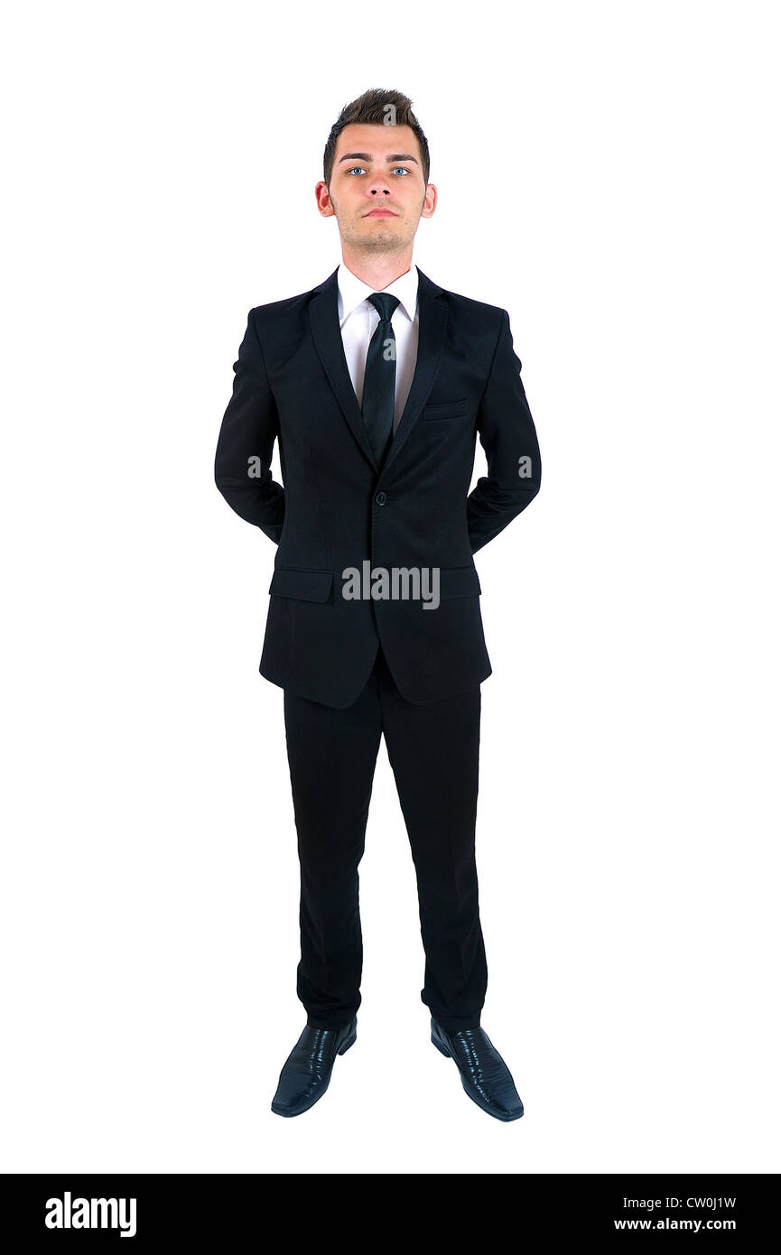 Isolated young business man standing Stock Photo - Alamy