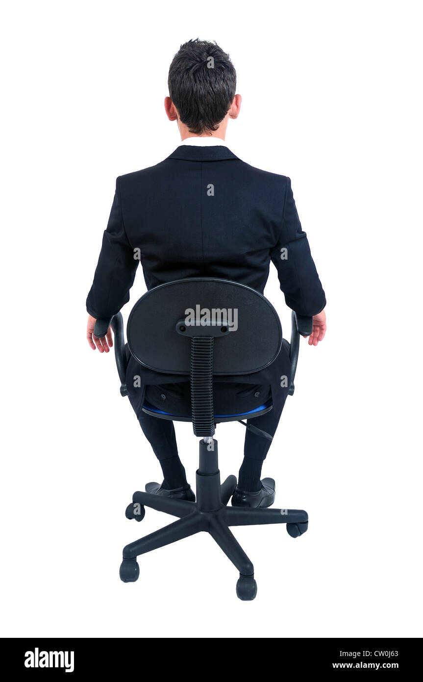 Isolated young business man standing on chair Stock Photo - Alamy