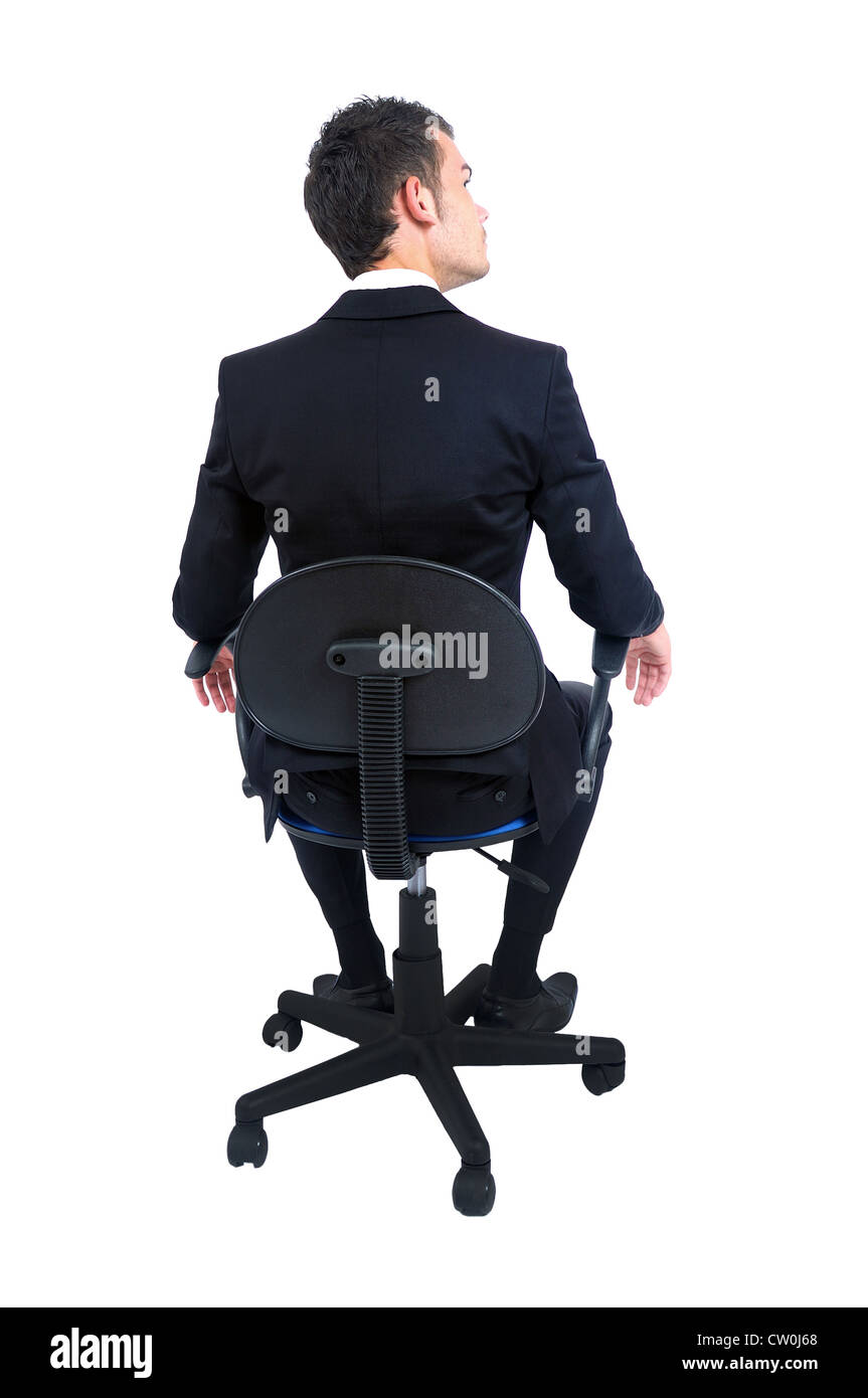 Isolated young business man standing on chair Stock Photo - Alamy