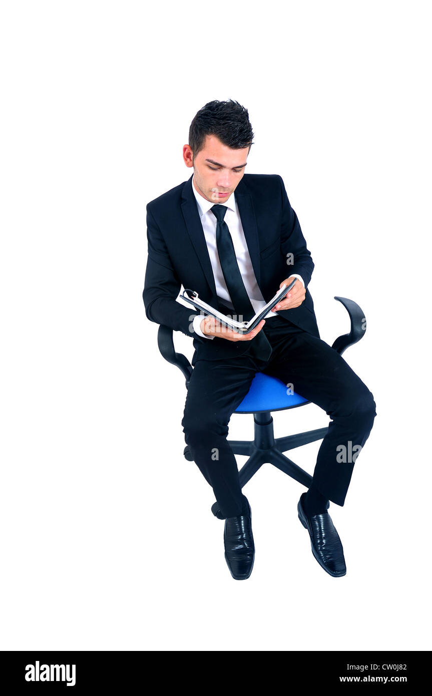 Man standing reading book Cut Out Stock Images & Pictures - Alamy