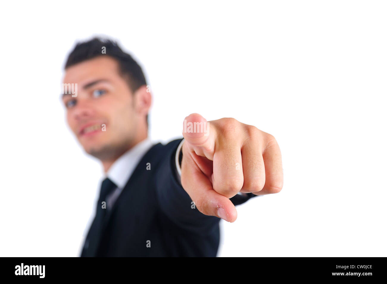 Isolated young business man pointing Stock Photo - Alamy