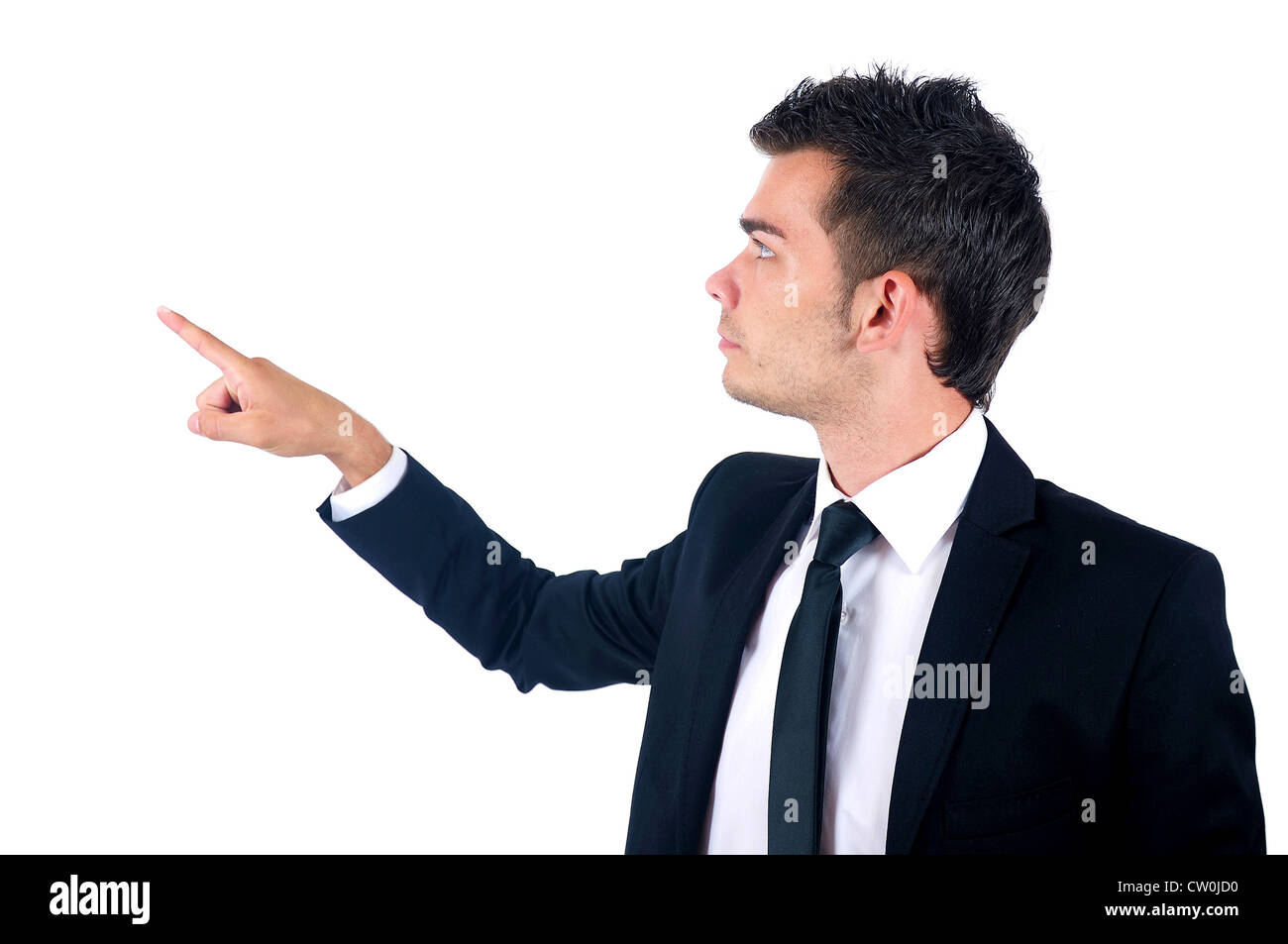 Isolated young business man pointing Stock Photo - Alamy