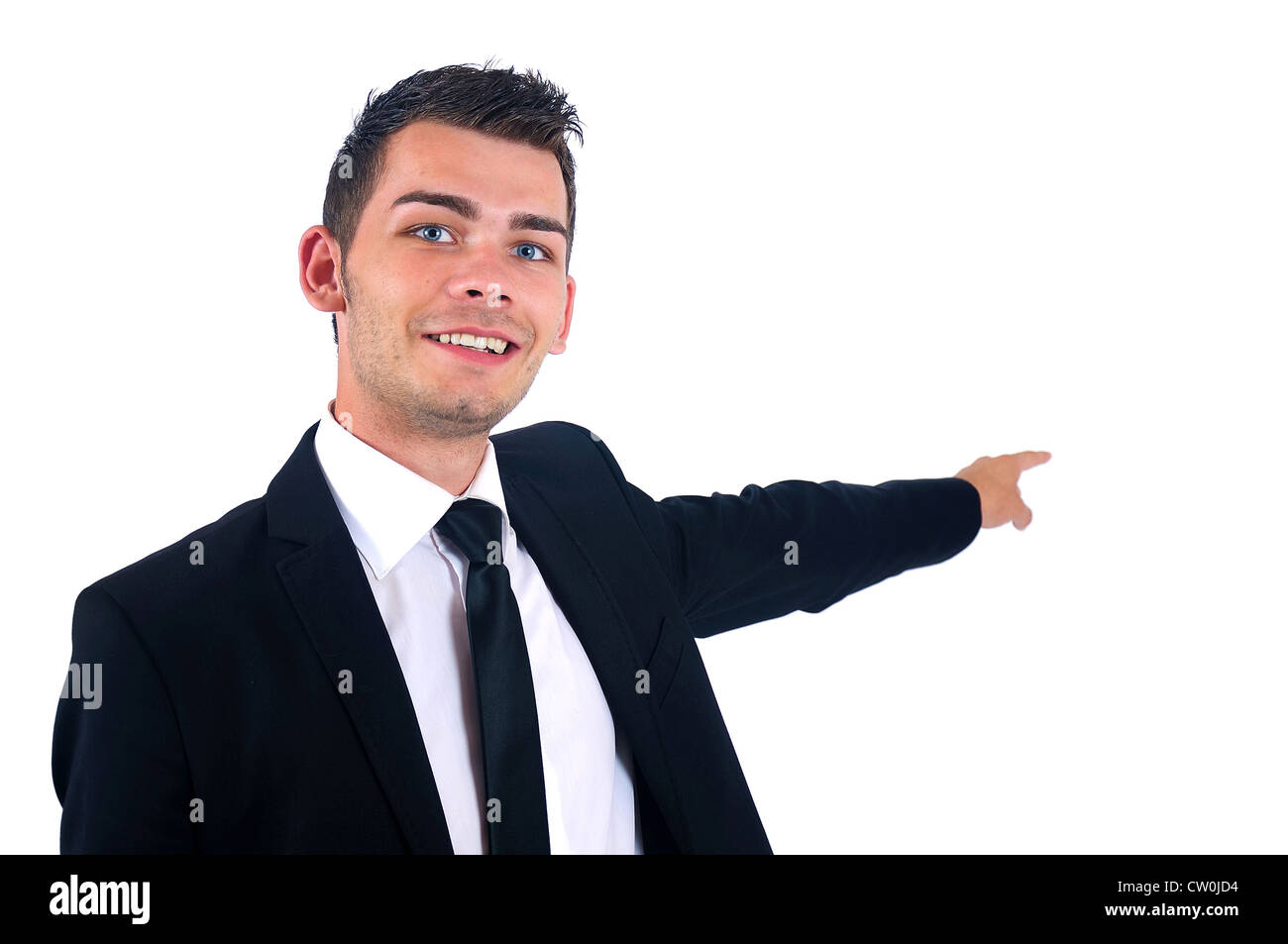Isolated young business man pointing Stock Photo - Alamy