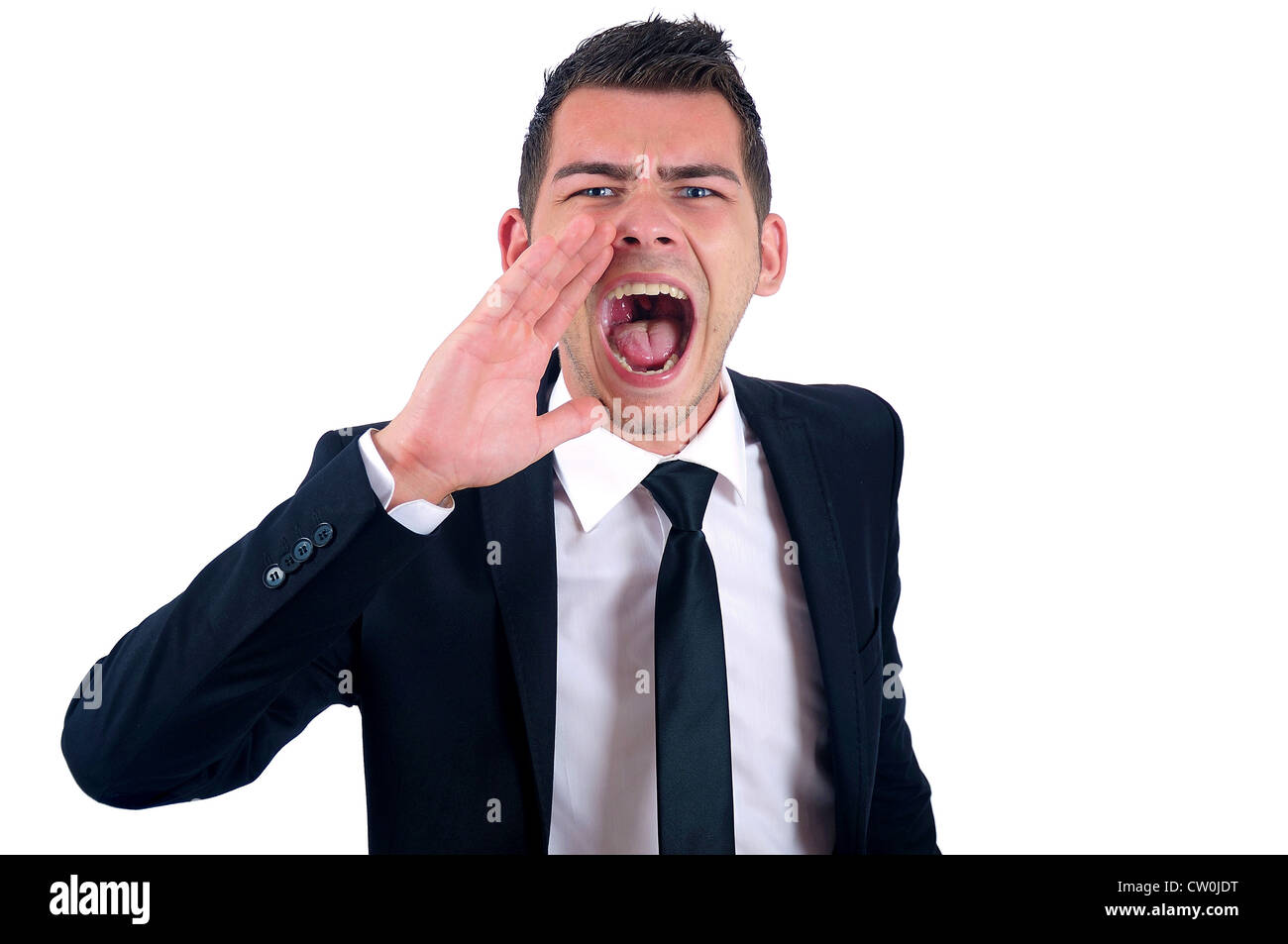 Isolated young business man screaming Stock Photo - Alamy