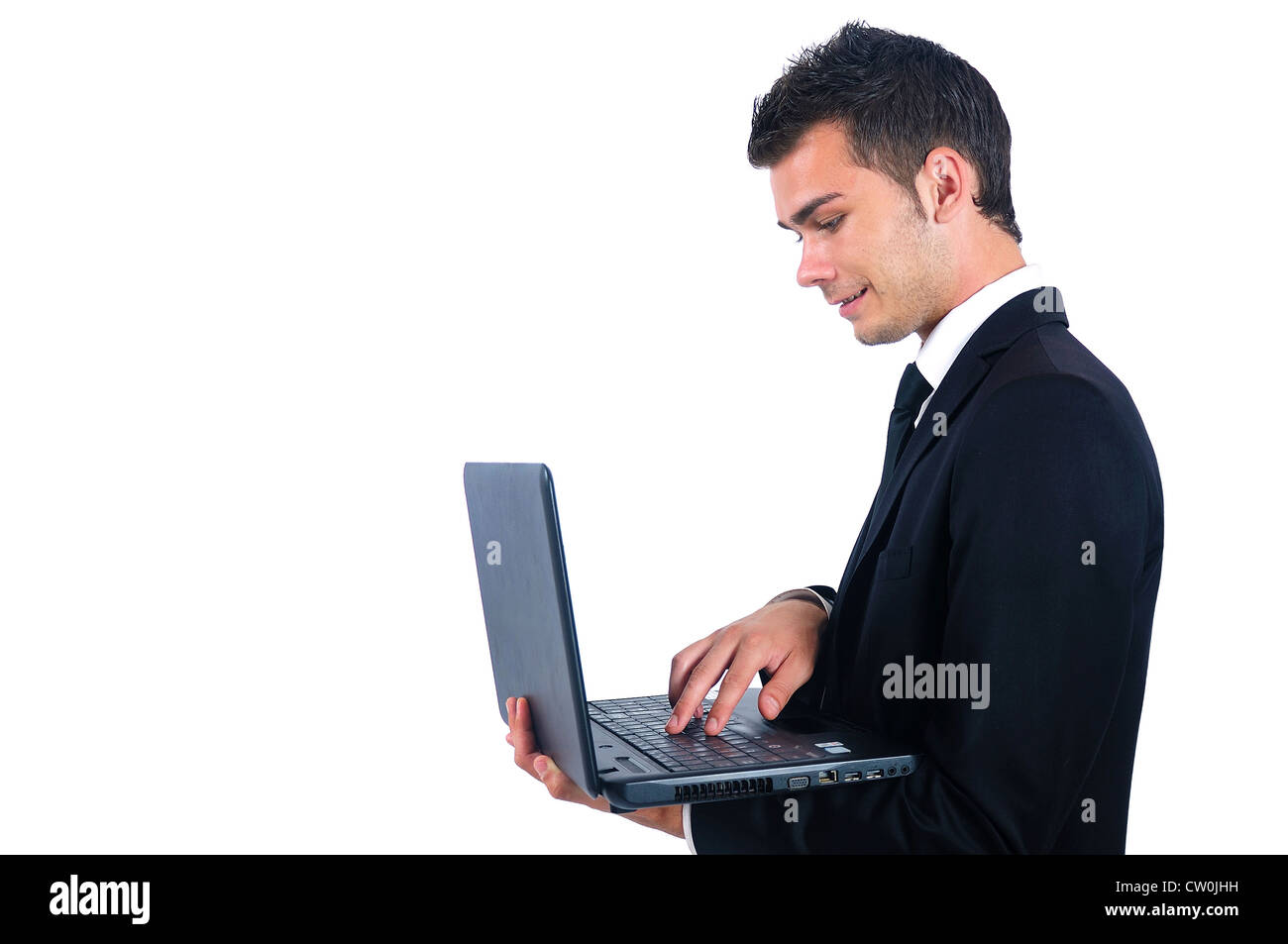Isolated business man with laptop Stock Photo - Alamy