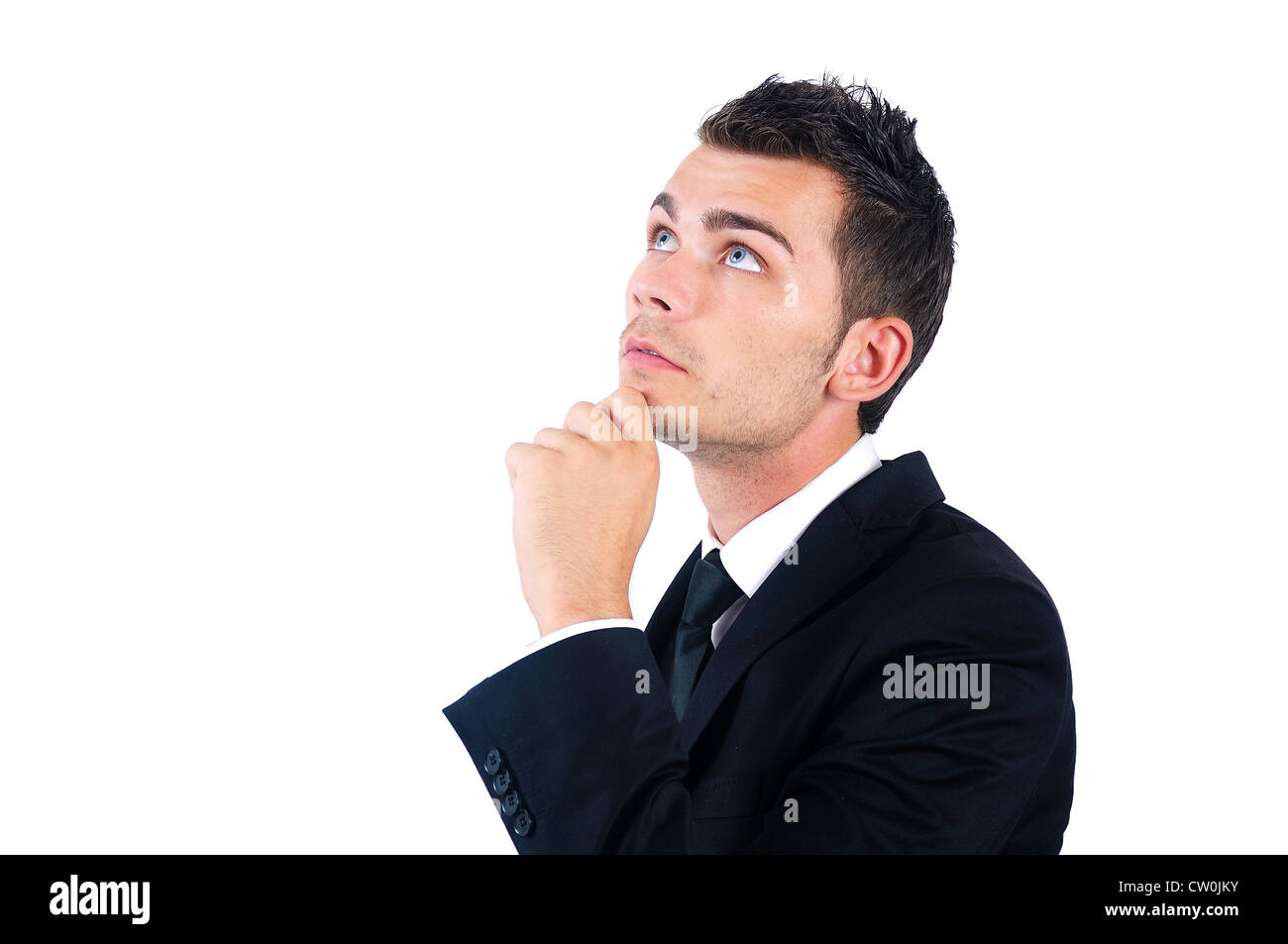 Isolated young business man thinking Stock Photo - Alamy