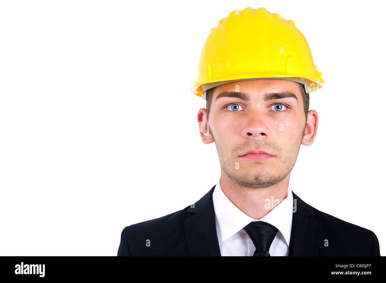 Isolated young worker with helmet Stock Photo - Alamy
