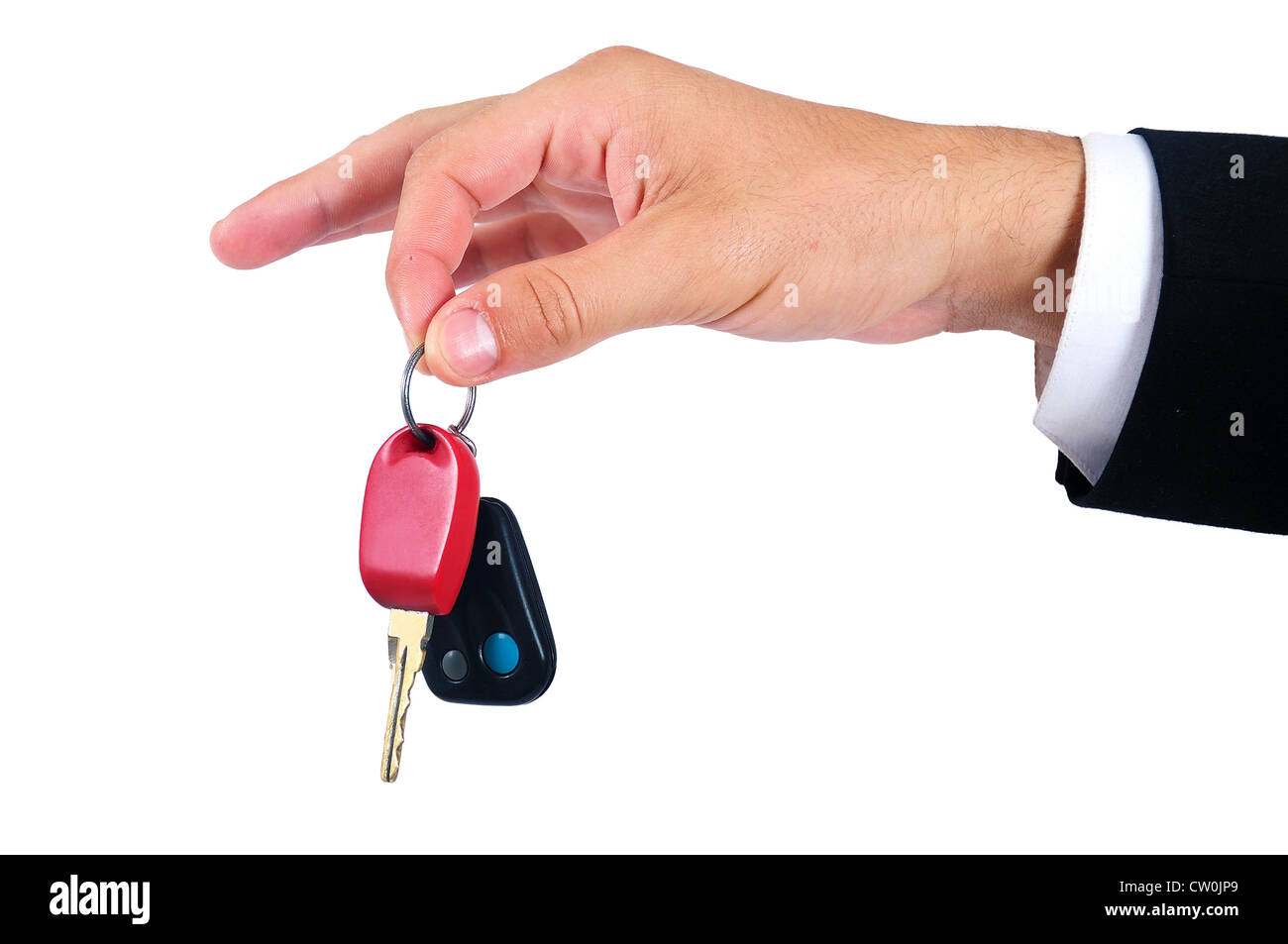Isolated closeup hand holding key Stock Photo - Alamy