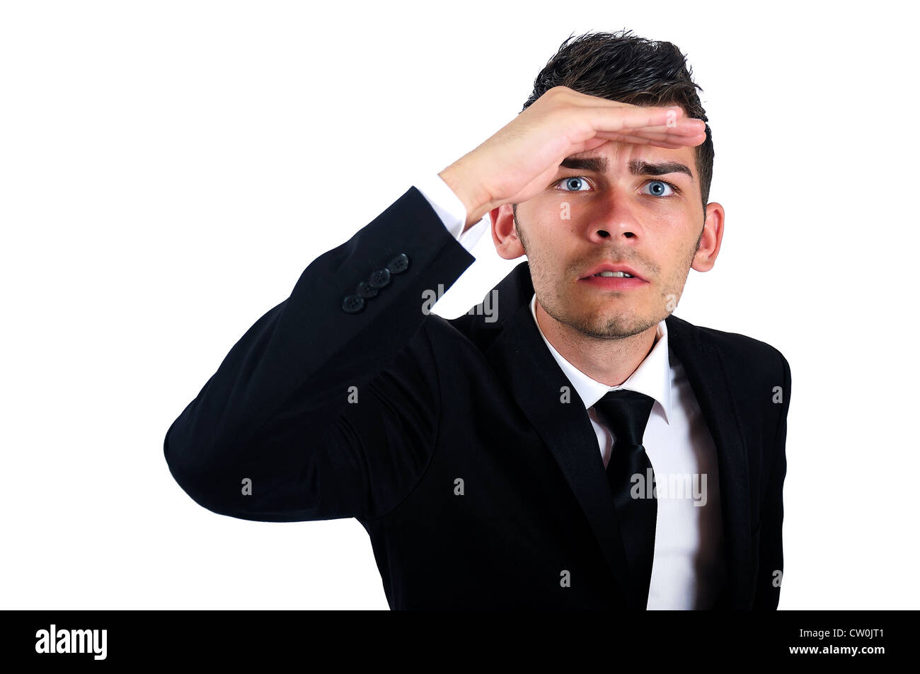 Isolated young business man looking Stock Photo - Alamy