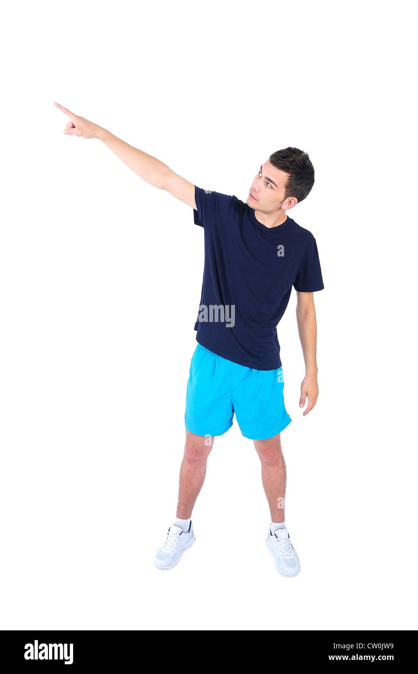 Isolated man in sport wear pointing Stock Photo - Alamy