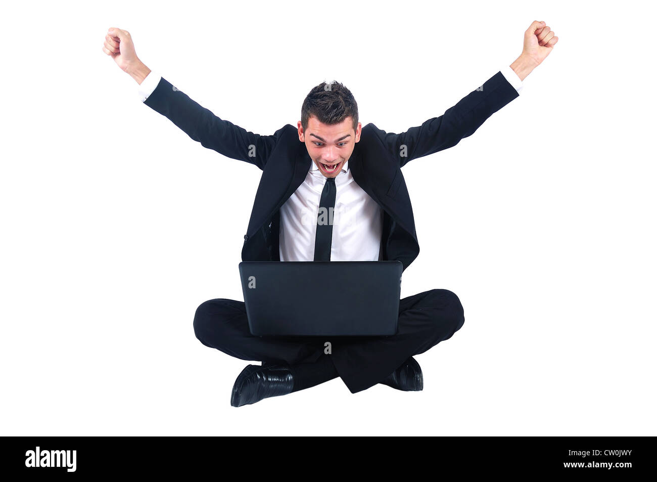 Isolated business man happy at notebook Stock Photo - Alamy