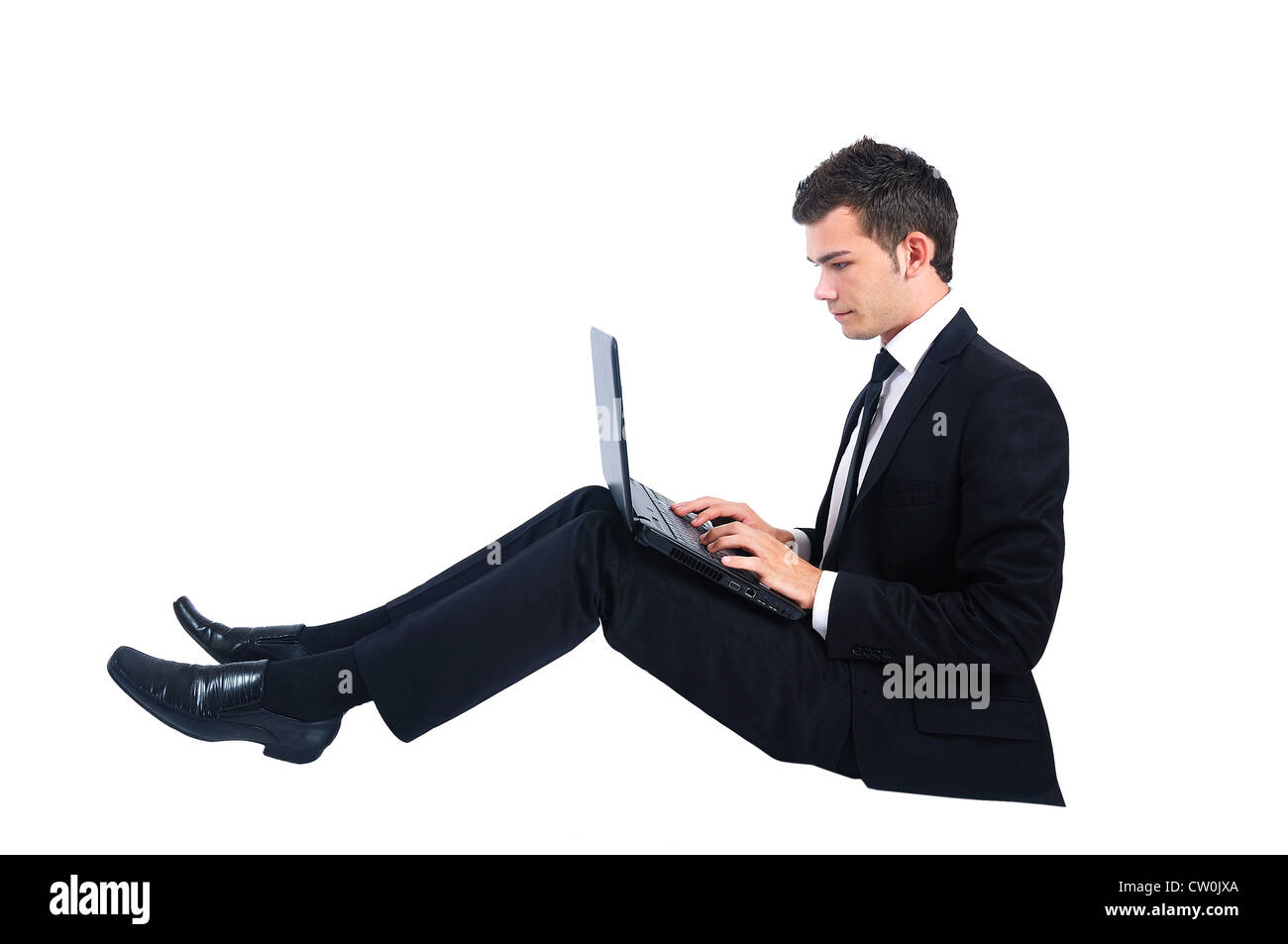 Isolated business man with notebook Stock Photo - Alamy