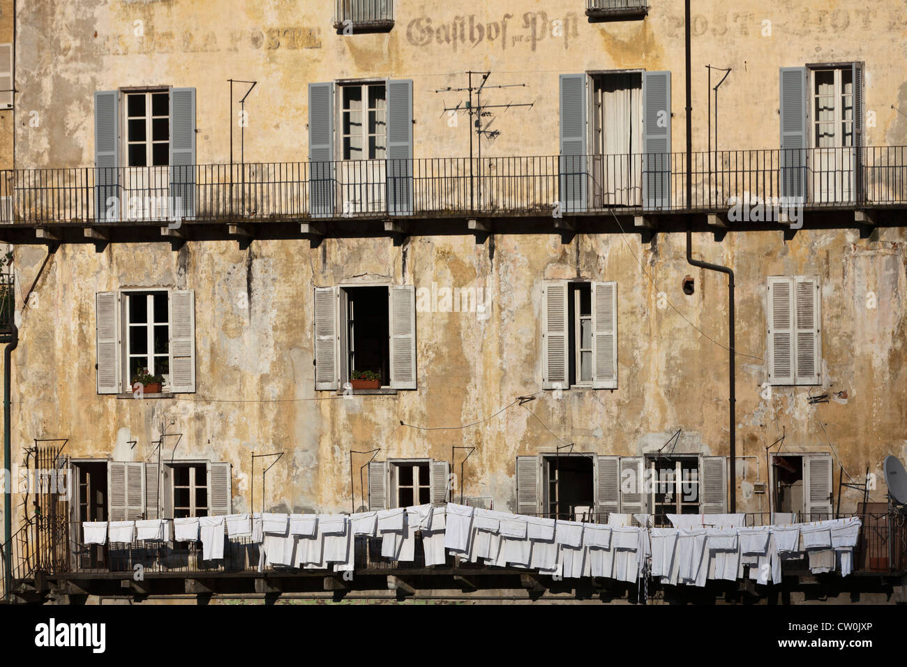 Close up of washing line on old building Stock Photo - Alamy