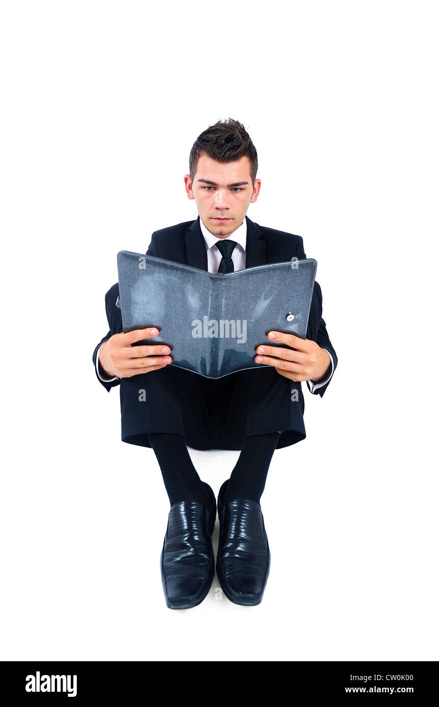 Businessman in suit reading briefing hi-res stock photography and ...