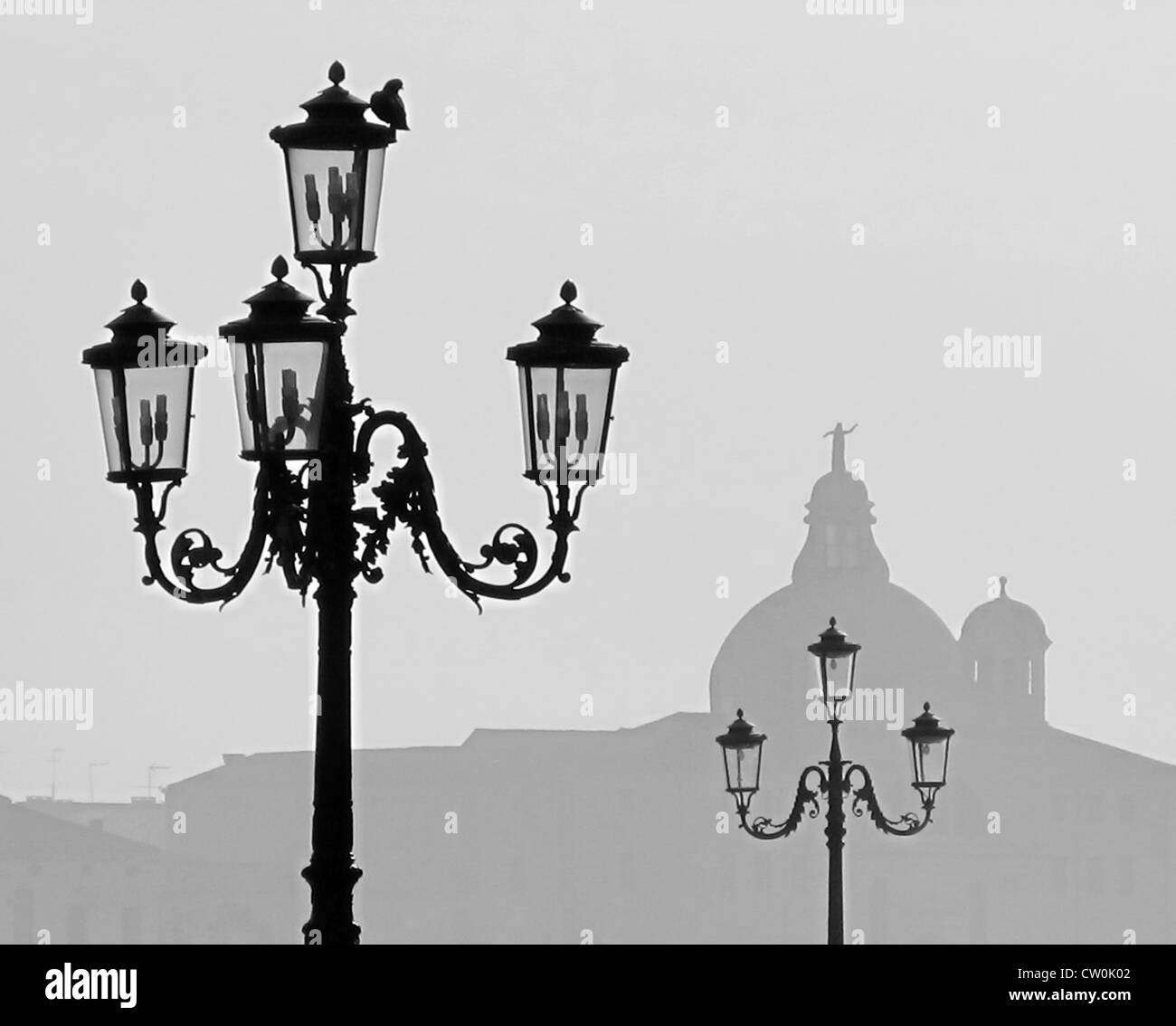 Traditional lamps with Basilica di Santa Maria della Salute in the ...
