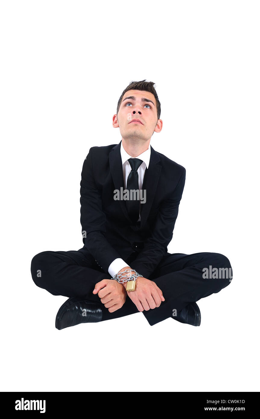 Isolated business man locked with chain Stock Photo - Alamy