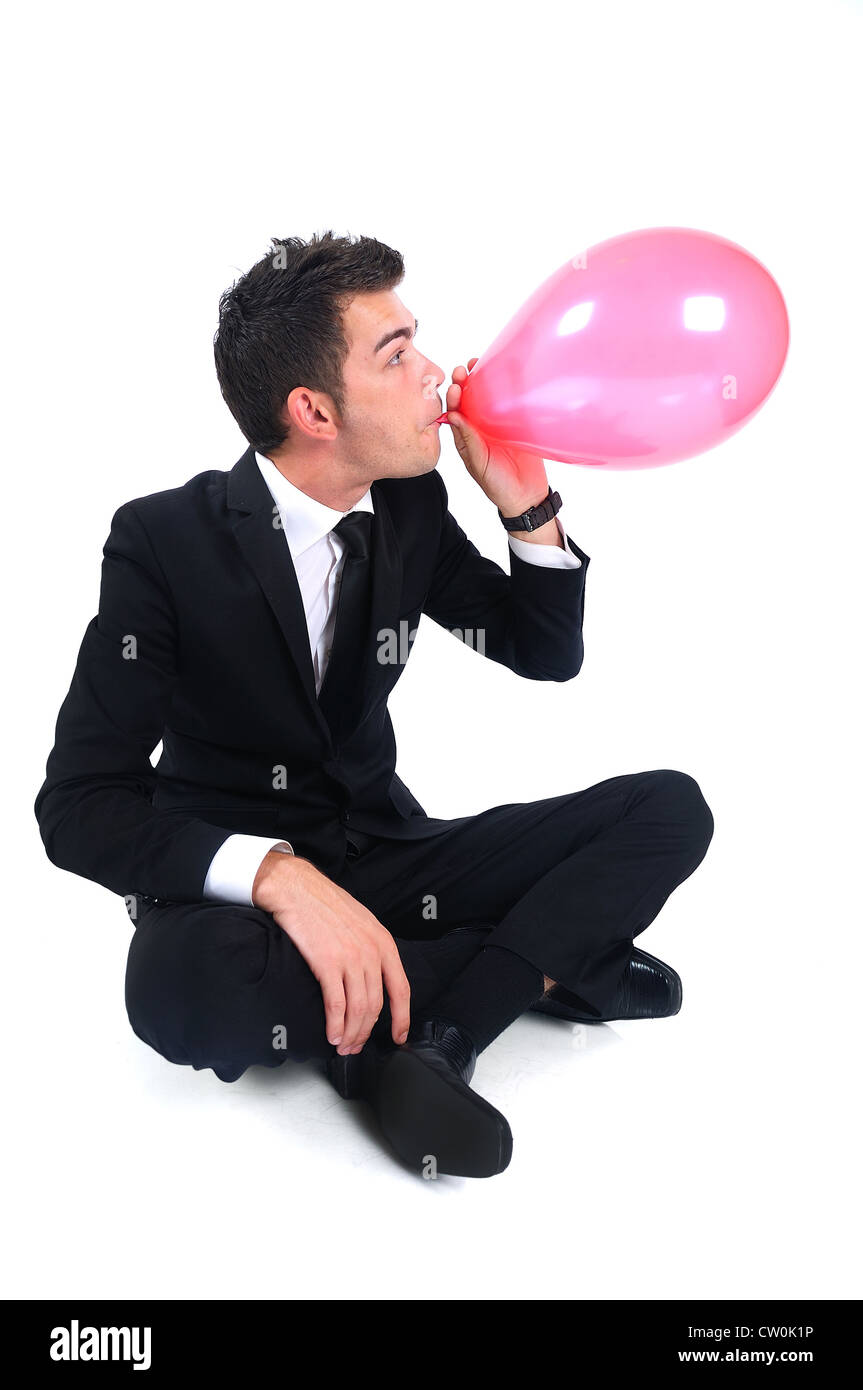 Isolated business man blow balloon Stock Photo - Alamy Isolated business man blow balloon Stock Photo - Alamy
