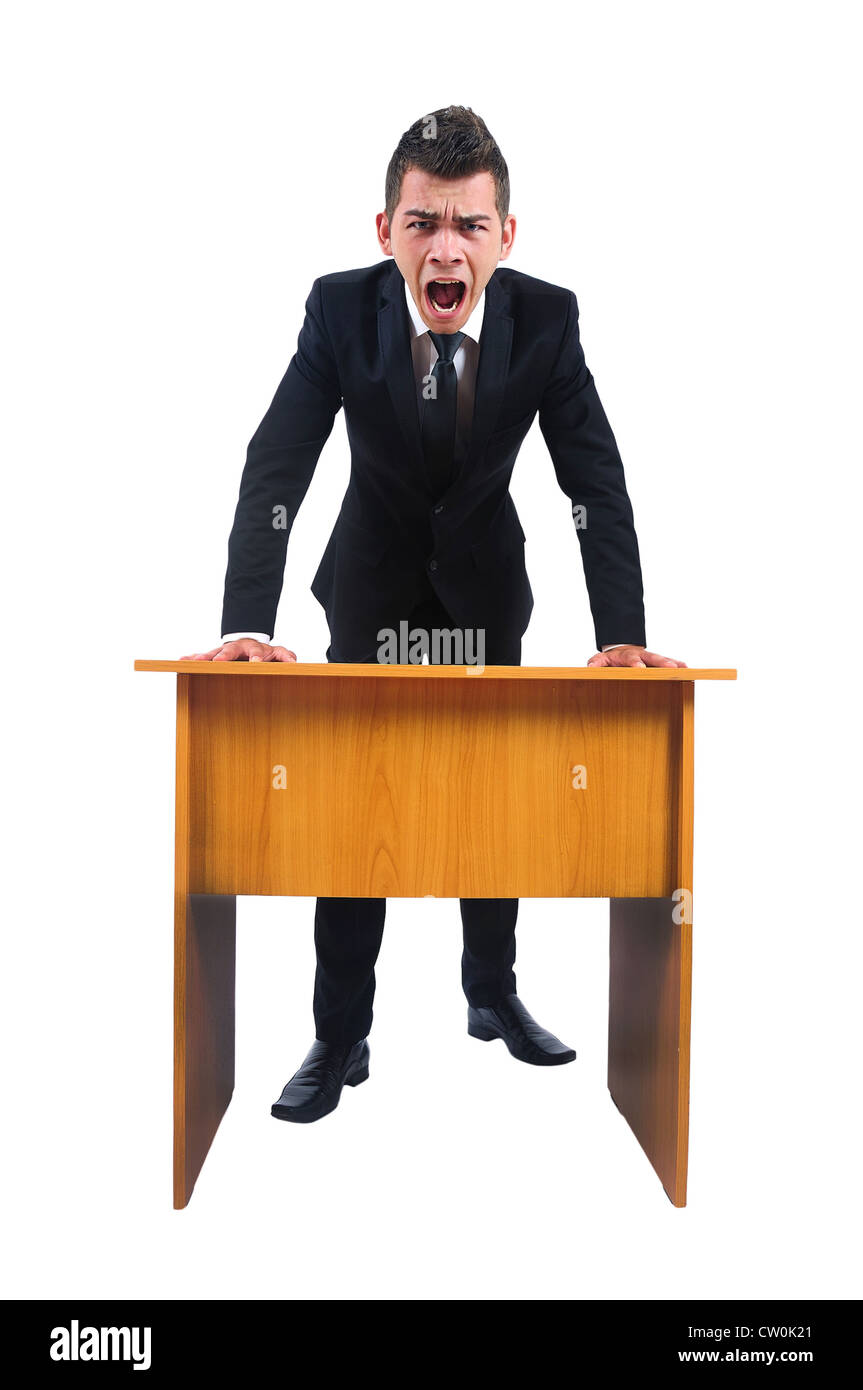 Isolated business man screaming at desk Stock Photo - Alamy