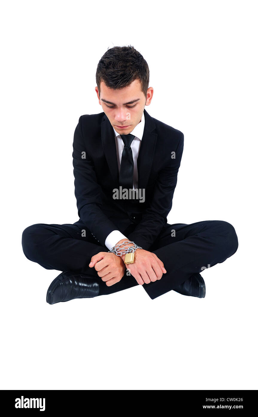 Isolated business man locked with chain Stock Photo - Alamy