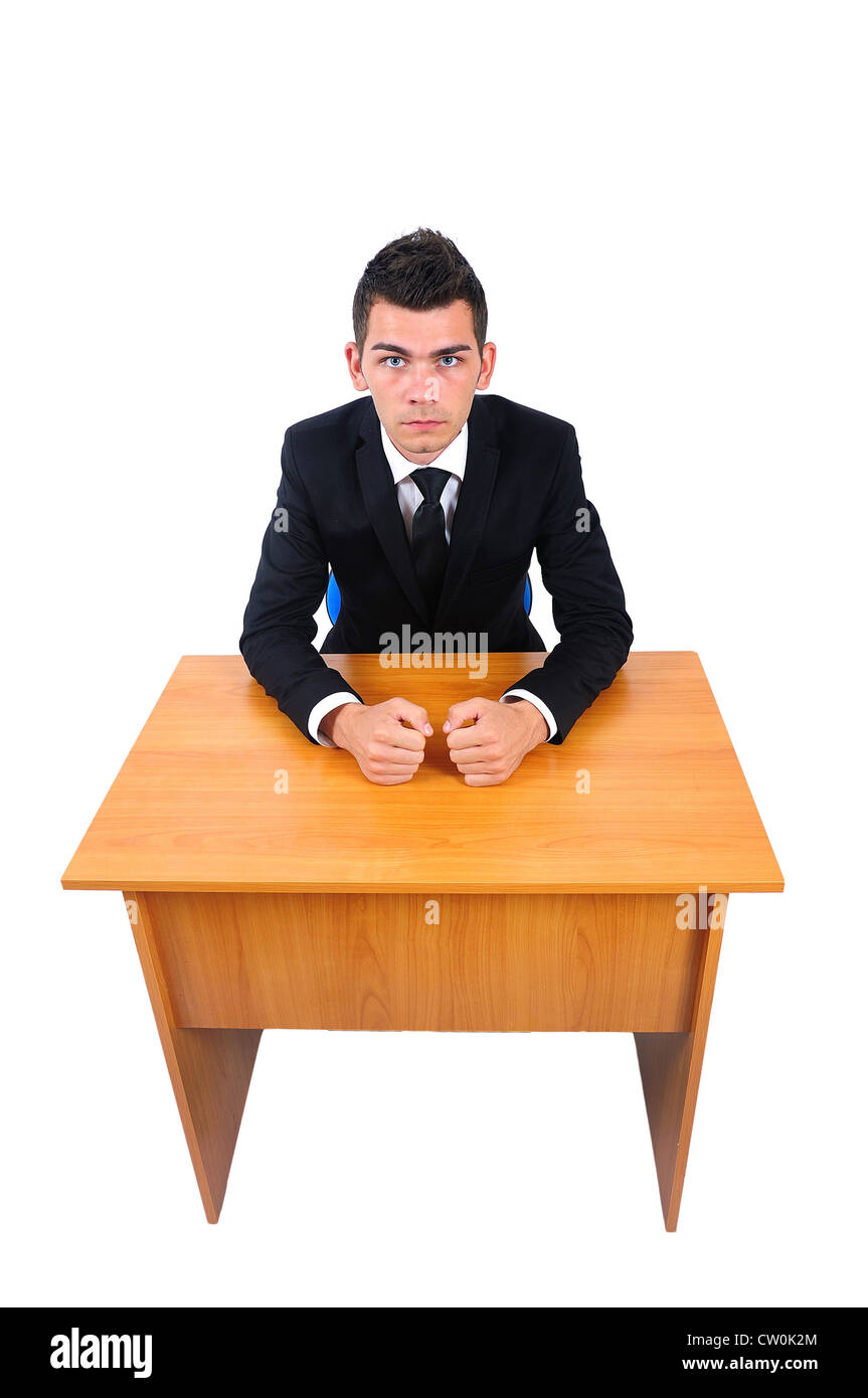 Isolated business man angry at desk Stock Photo - Alamy