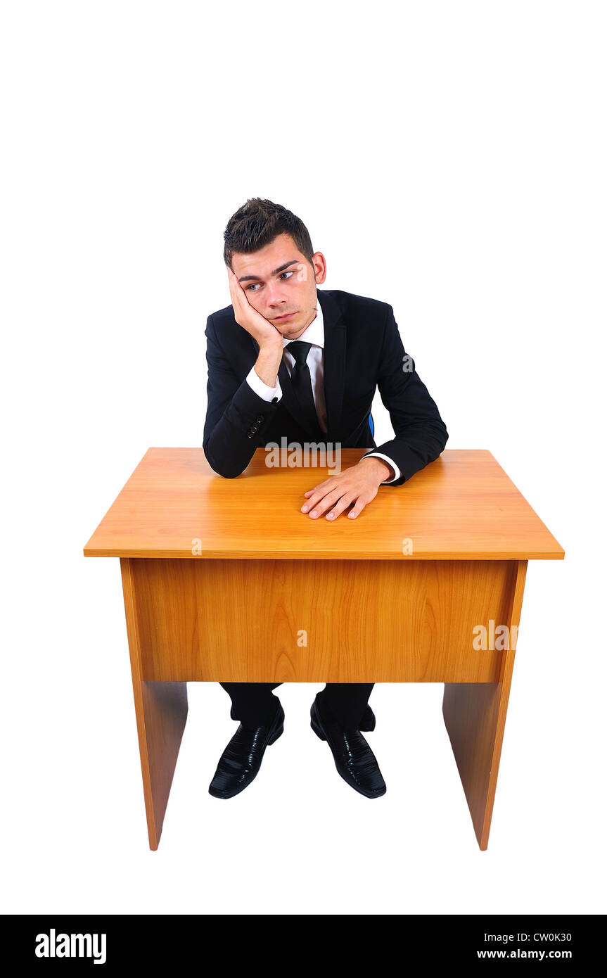 Young man tired of office work Cut Out Stock Images & Pictures - Alamy