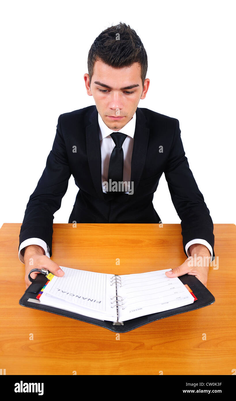 Isolated business man reading at desk Stock Photo - Alamy