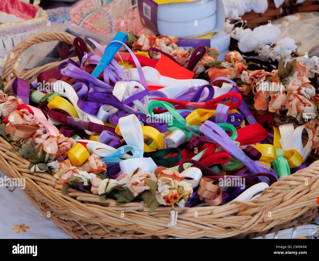 a basket full of coloured ribbons Stock Photo - Alamy